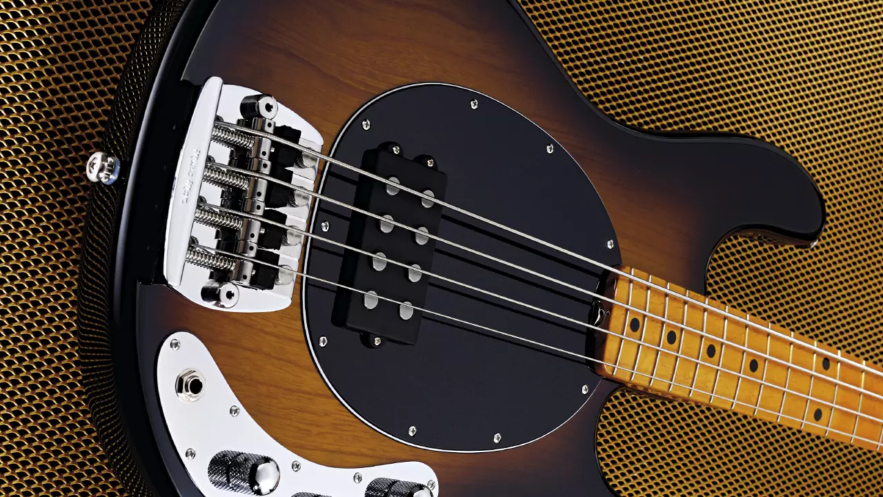 Music Man Stingray op tweed achtergrond